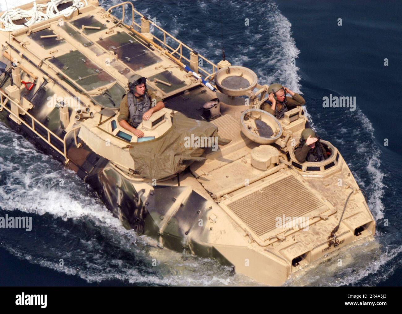 US Navy An Amphibious assault vehicle (AAV) approaches the well deck ...