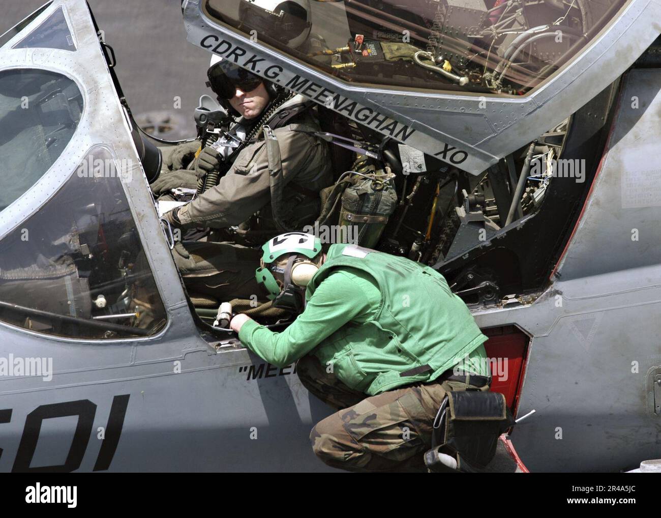 US Navy Carrier Air Wing maintenance personnel complete pre-flight ...