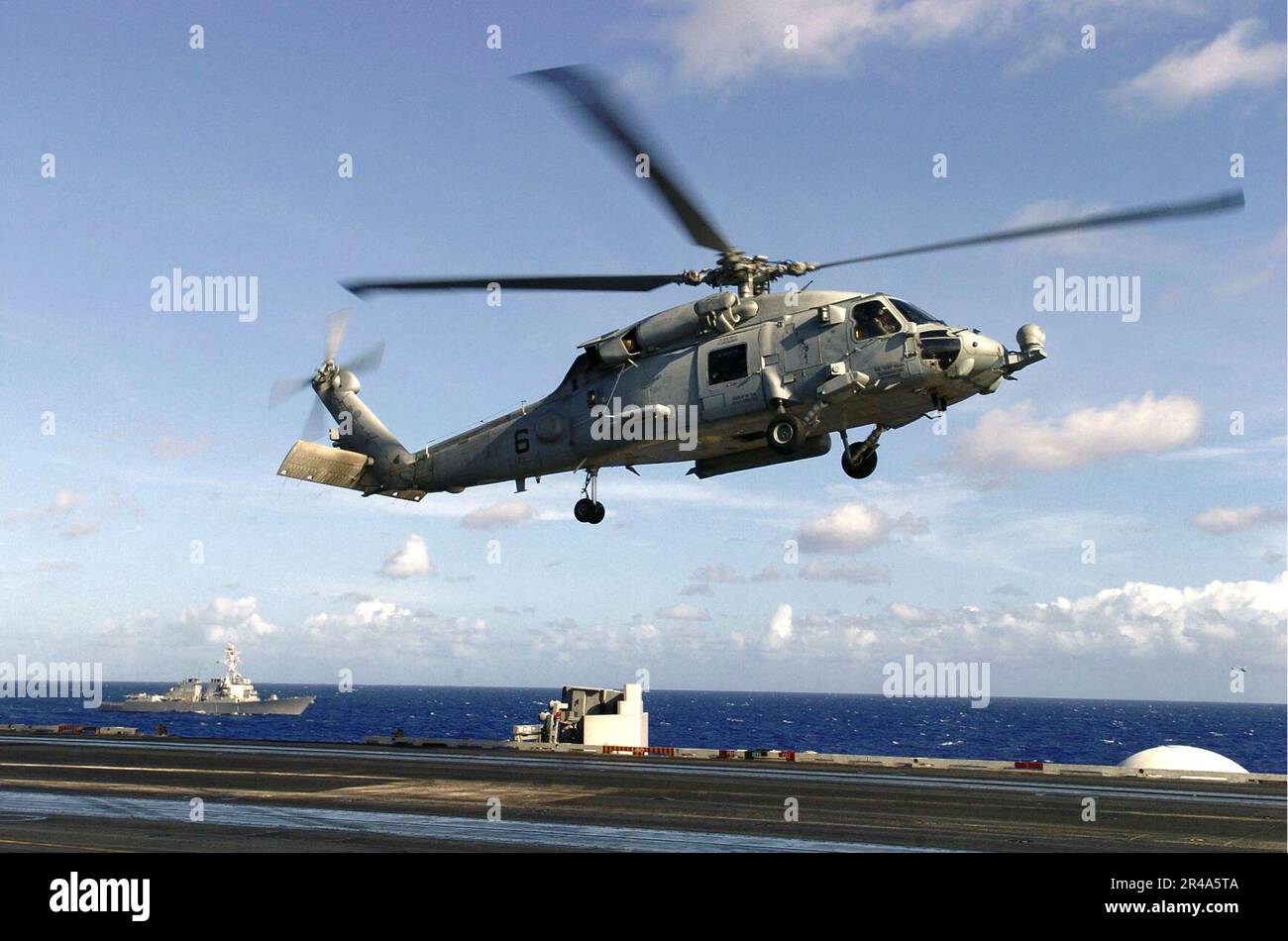 US Navy With the guided missile destroyer USS Howard (DDG 83) cruising ...