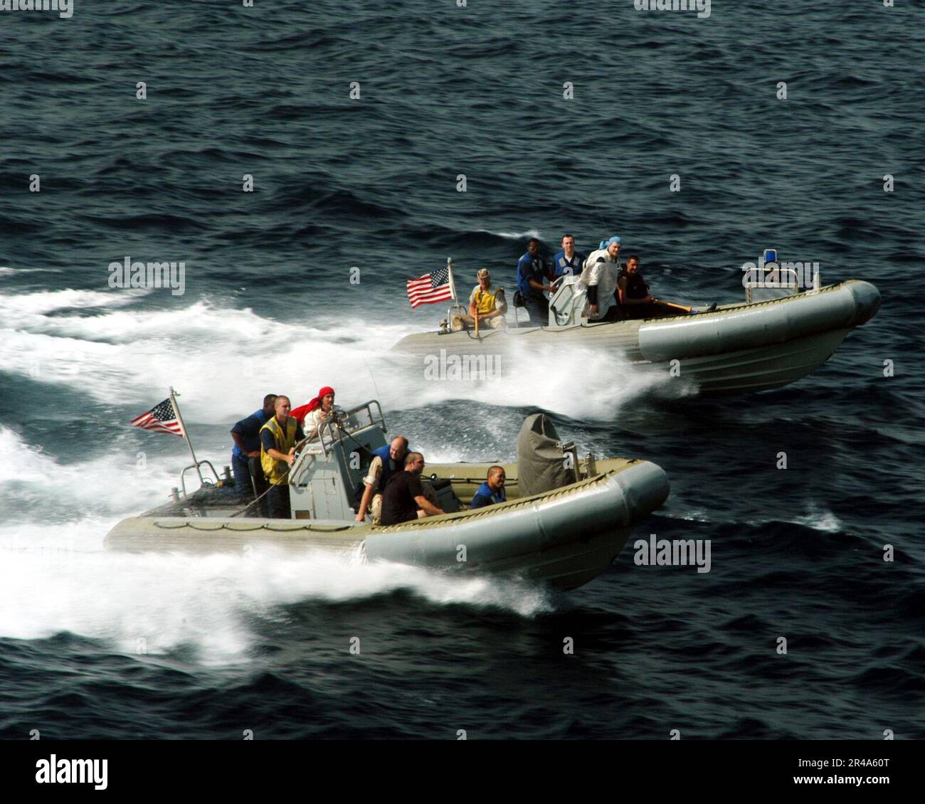 US Navy USS John F Kennedy (CV 67) and the USS Vicksburg (CG 69) crew ...