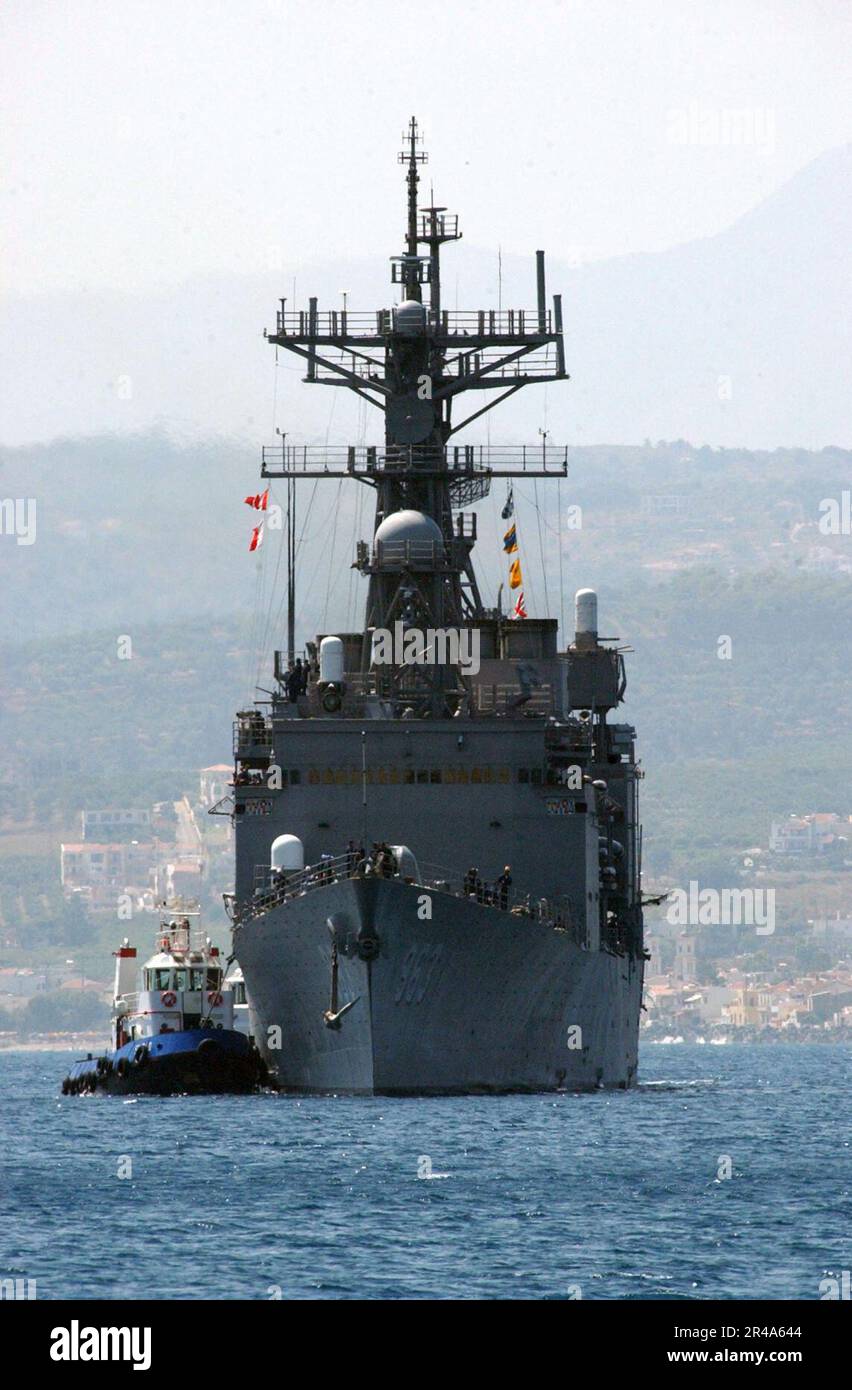 US Navy The destroyer USS Spruance (DD 963) is escorted by tugs as she ...