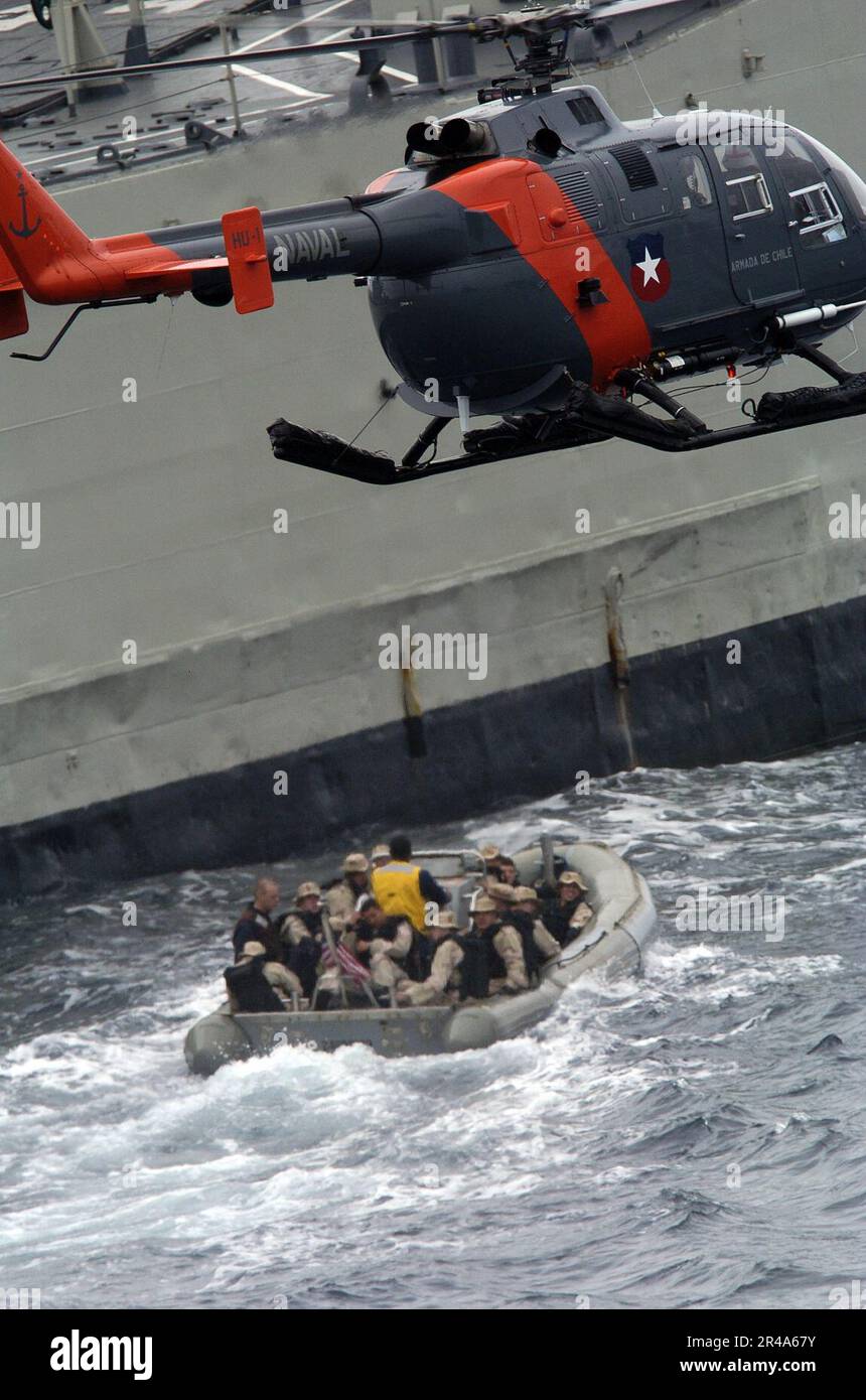 US Navy A boarding team from USS Thomas S. Gates (CG 51) rides a Rigid ...