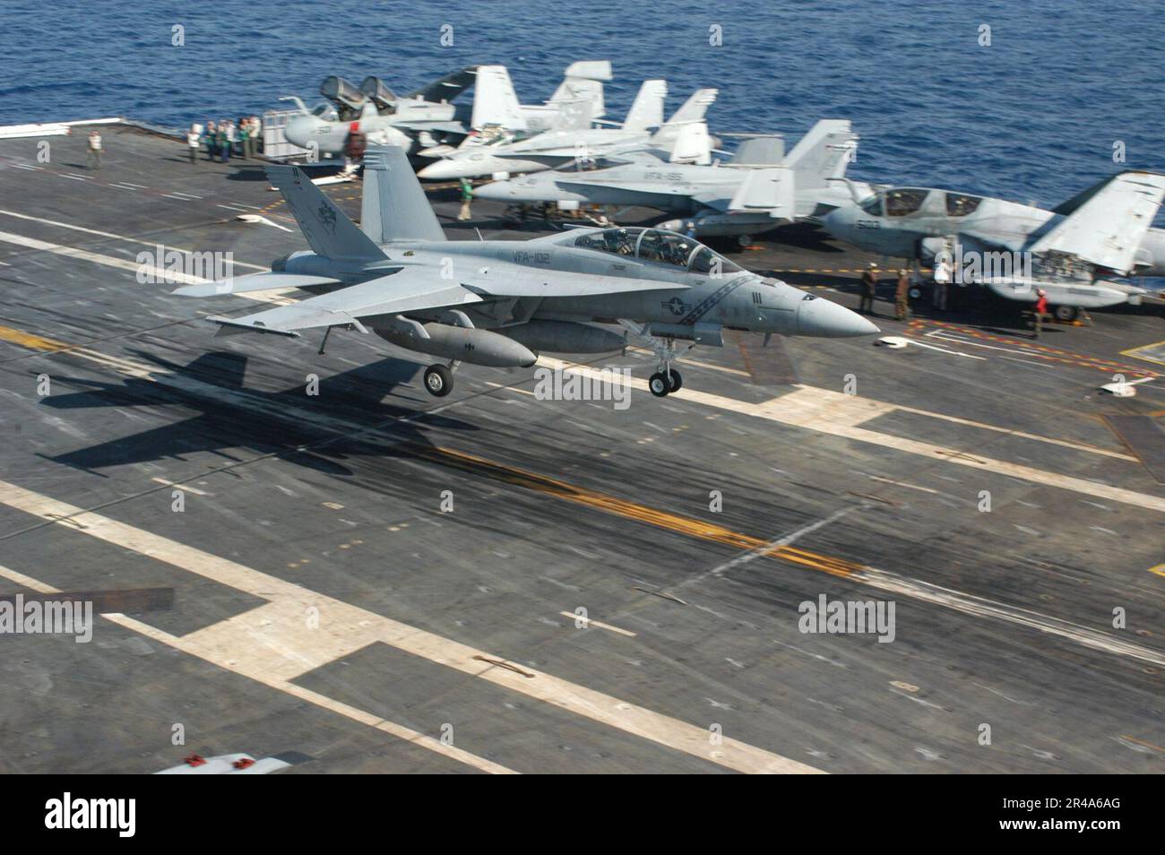 US Navy An F-A-18F Super Hornet assigned to Strike Fighter Squadron One Zero Two (VFA-102) lands ...