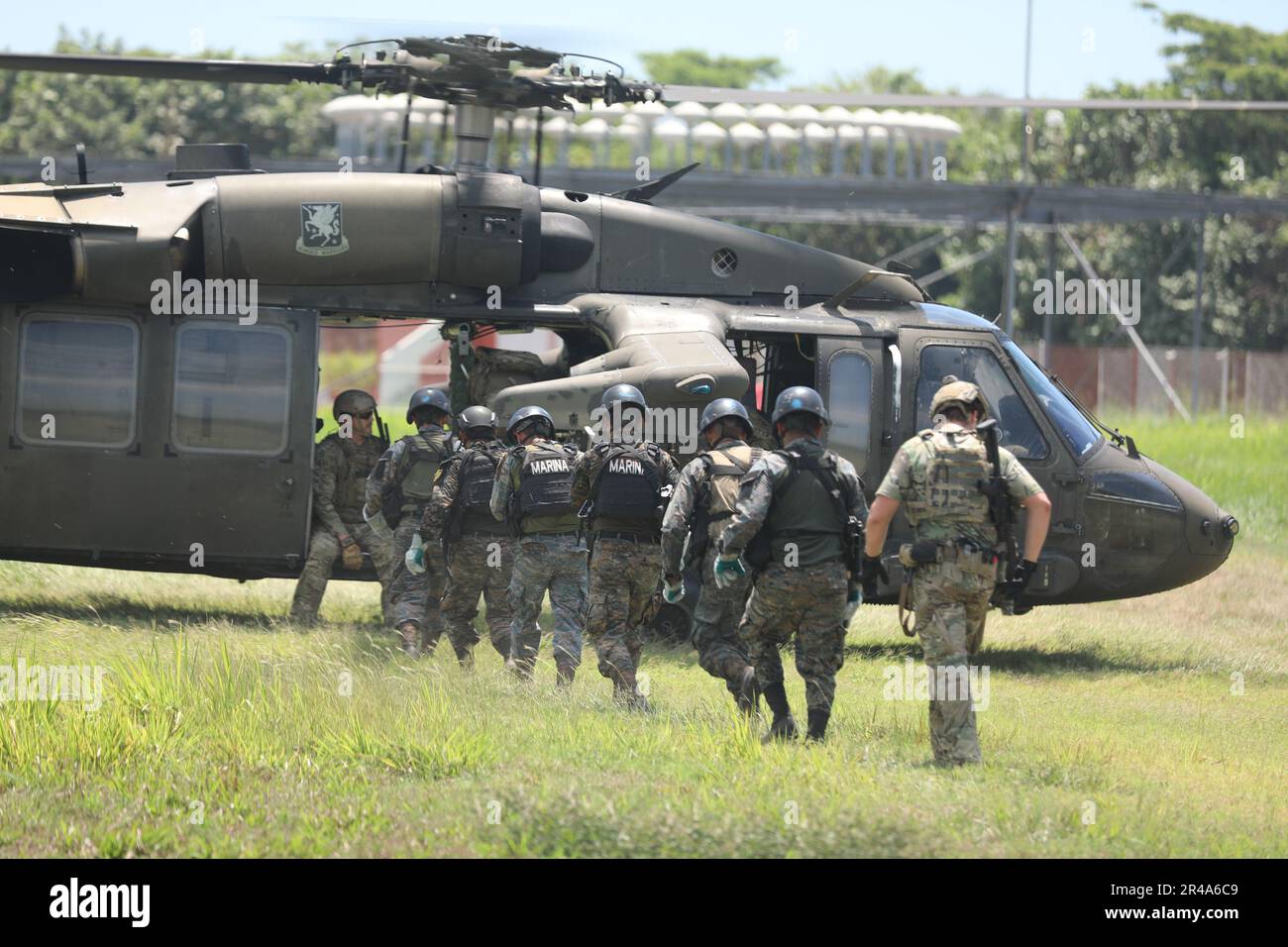 Guatemalan Naval Special Forces board a UH60 Blackhawk with Navy SEAL ...