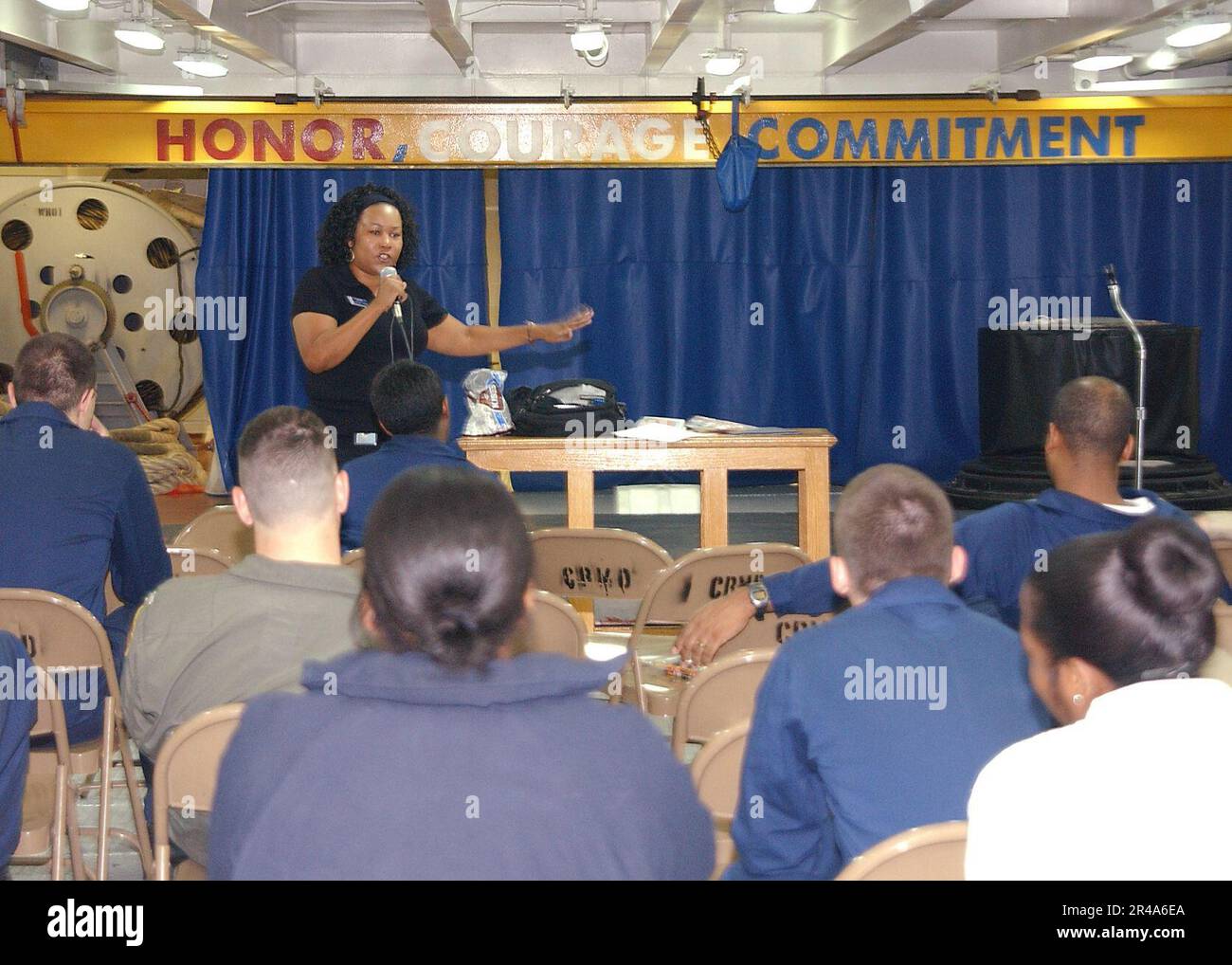 US Navy Family Support Center instructor, Shauna Turner holds a ...
