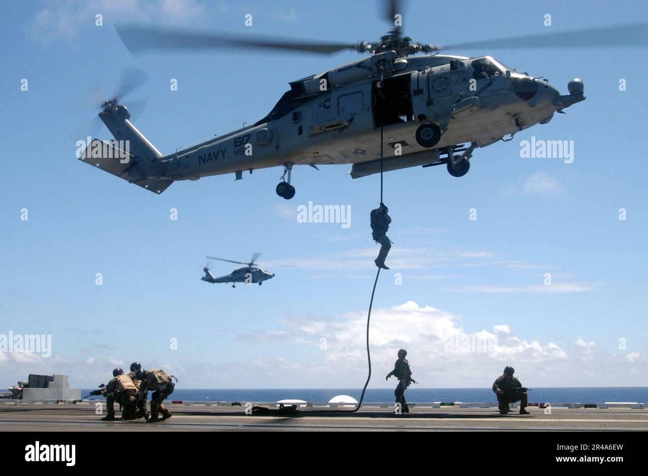 US Navy Members of Explosive Ordnance Disposal Mobile Unit Six (EOD MU ...