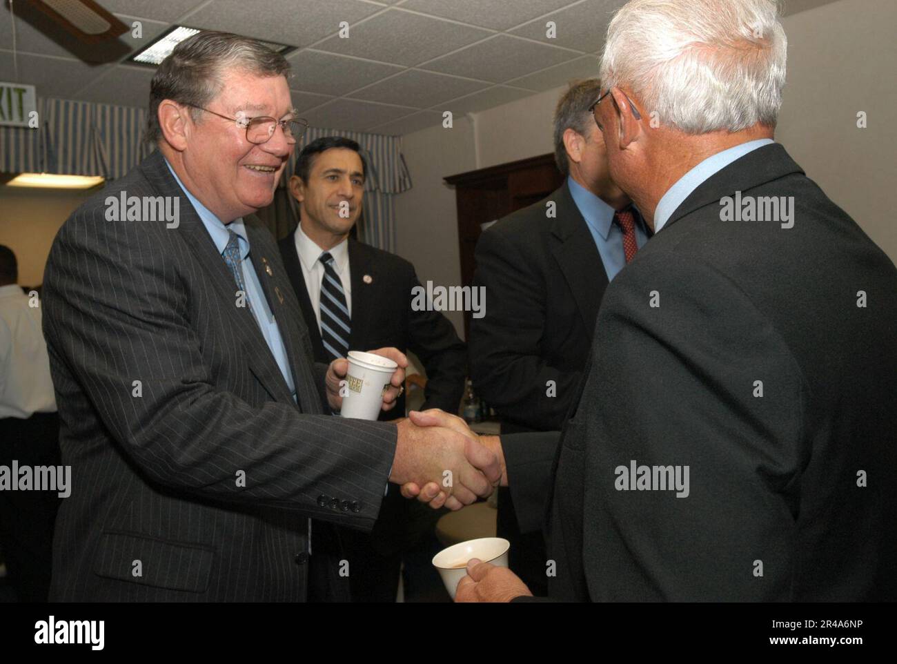 US Navy Rep. Randy Duke Cunningham (R-San Diego) receives instructions ...