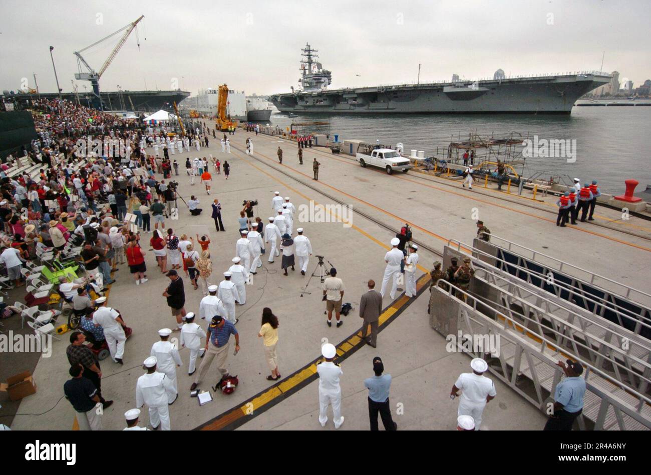 US Navy Family and friends anxiously wait on board Naval Air Station ...