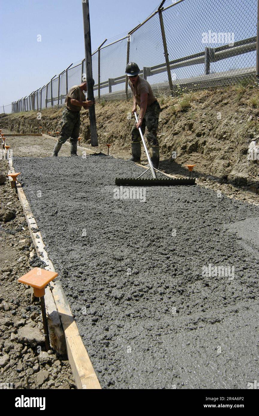 US Navy Seabees assigned to Naval Mobile Construction Battalion Seven ...