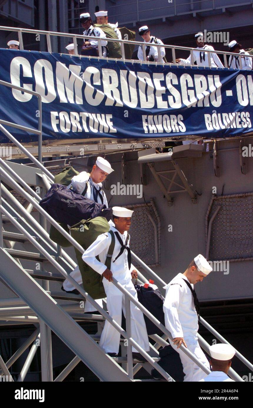 US Navy Anxious Sailors leave the brow aboard USS Ronald Reagan (CVN 76 ...
