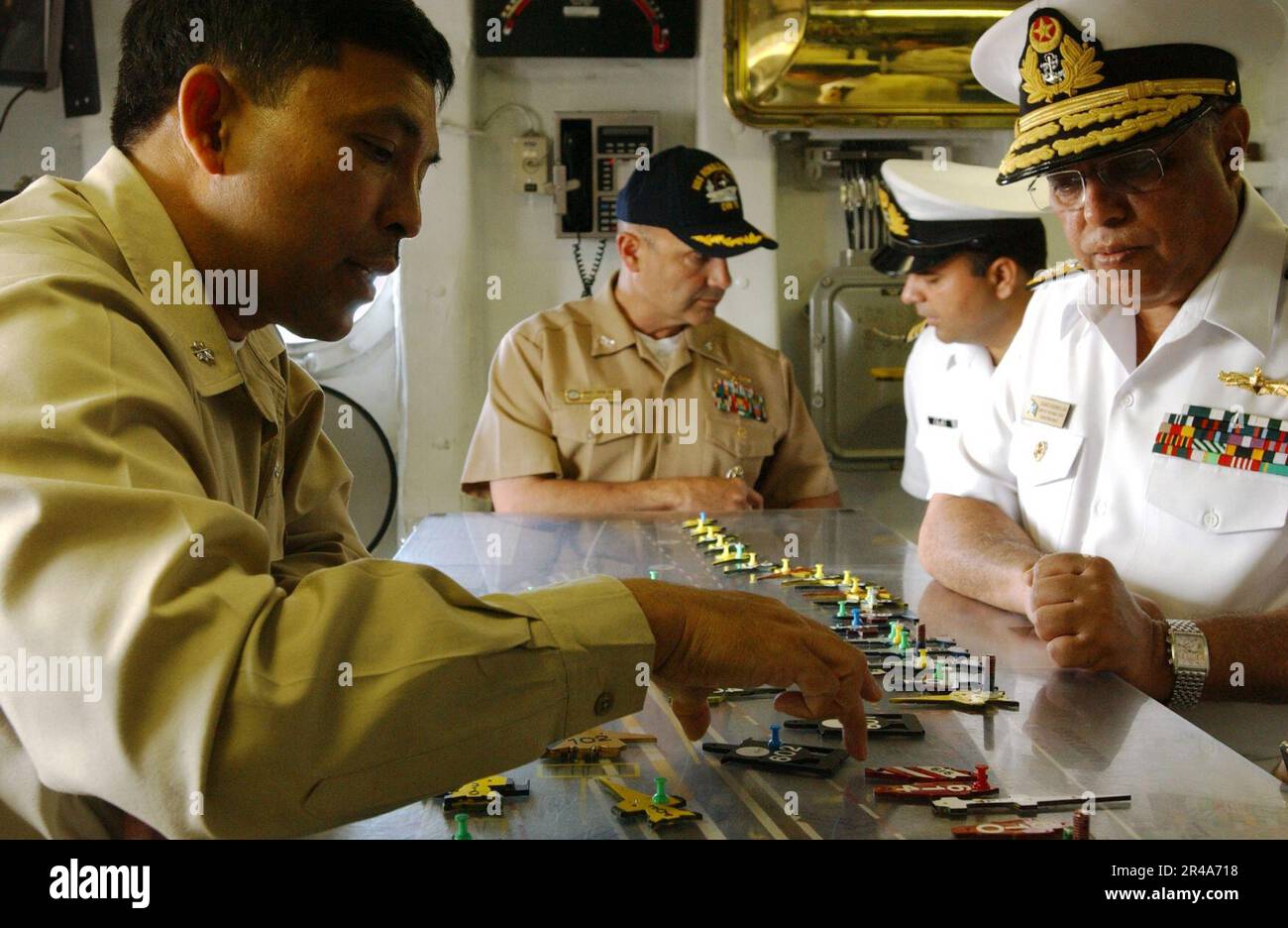 US Navy Aircraft handler, Cmdr. Joe Amper (left), of Manilla ...