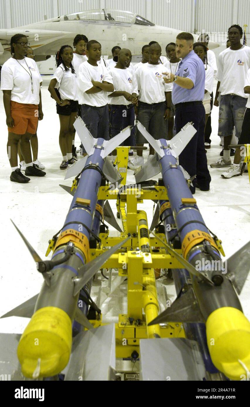 US Navy Aviation Ordnanceman 1st Class gives students from the ...