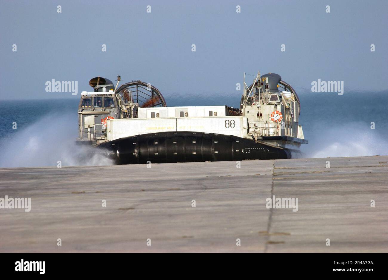US Navy A Landing Craft Air Cushion (LCAC) arrives to on load U.S ...