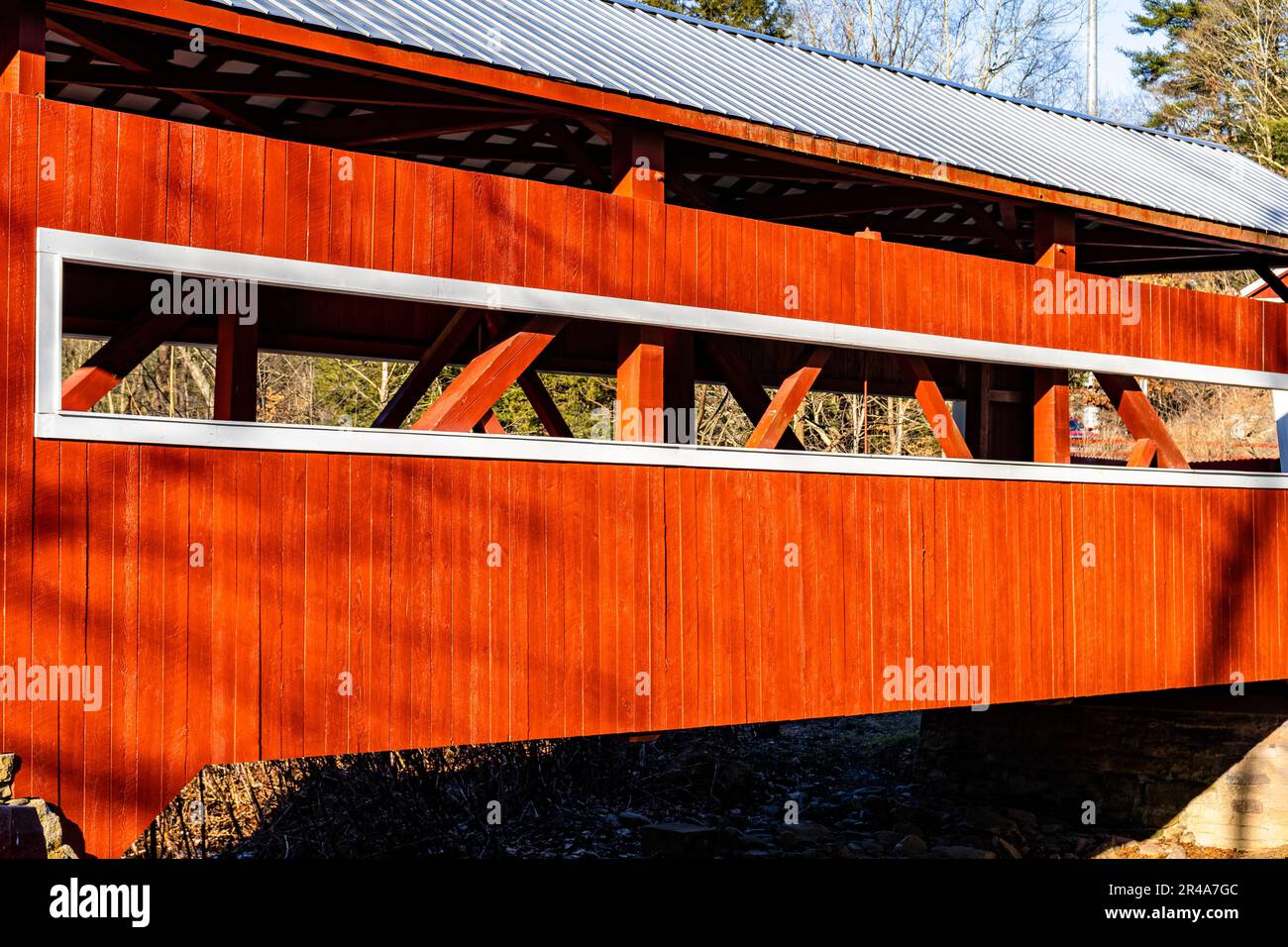 A scenic view of the red East and West Paden Twin Covered Bridges in ...