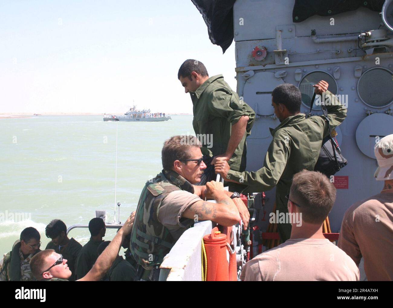 US Navy he crew of Motor Vessel EDHA II are greeted by a coalition ...