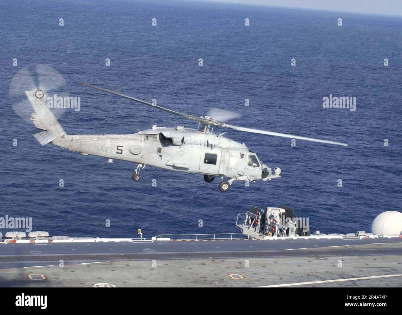 US Navy An SH-60F assigned to the Light Helicopter Anti-Submarine Four ...