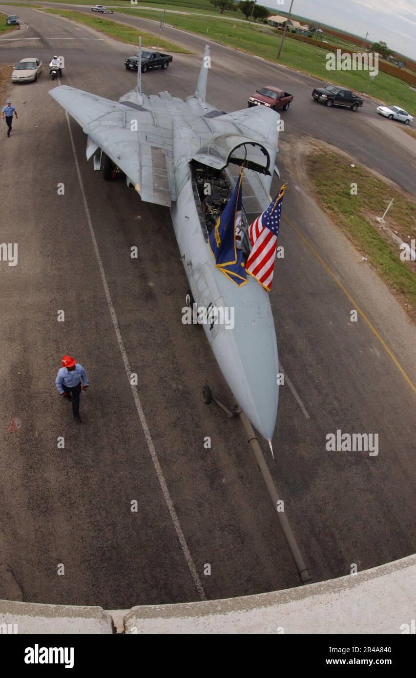 US Navy A decommissioned F-14A Tomcat is towed from San Angelo Regional ...