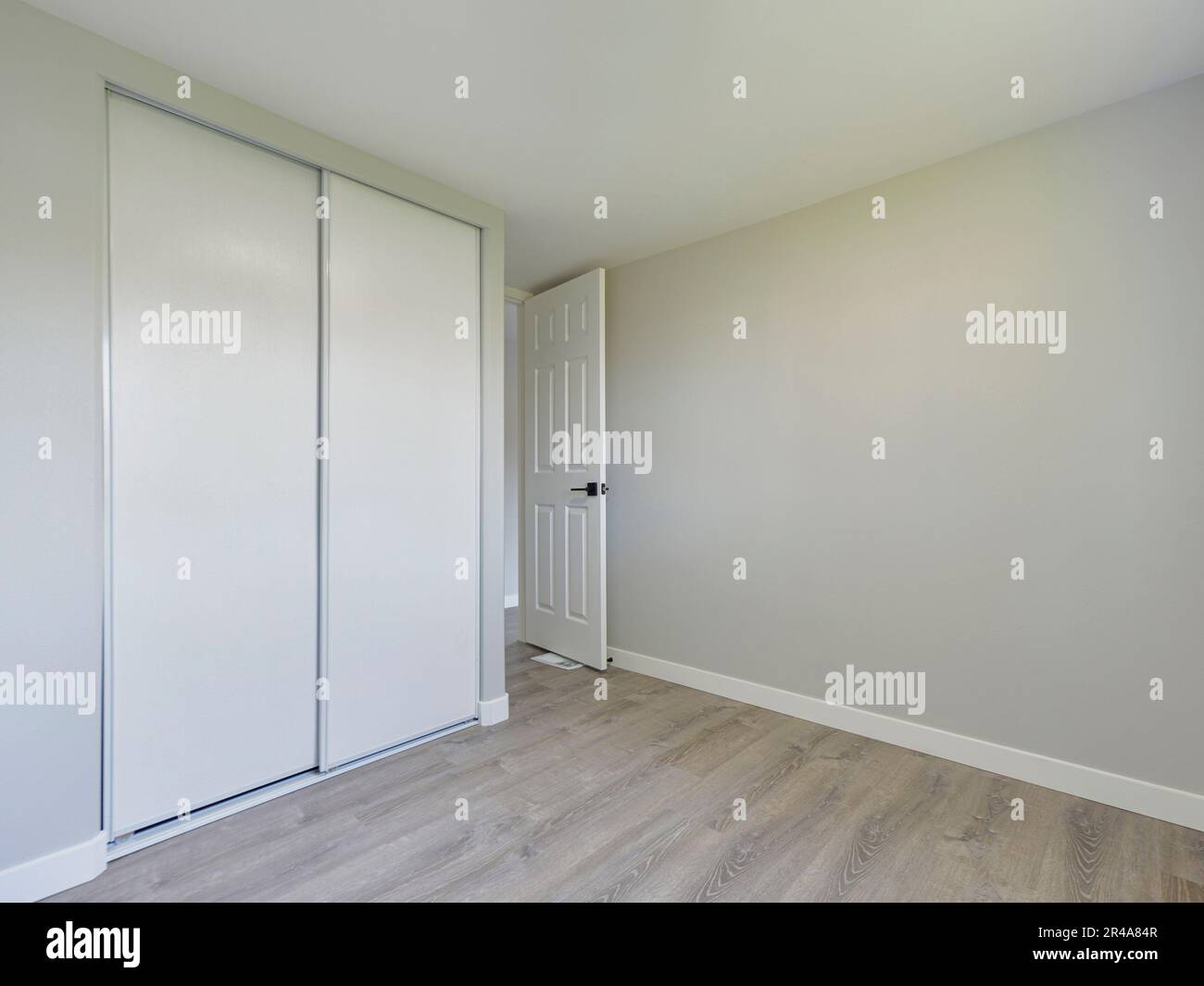 Modern residential empty bedroom interior Stock Photo - Alamy