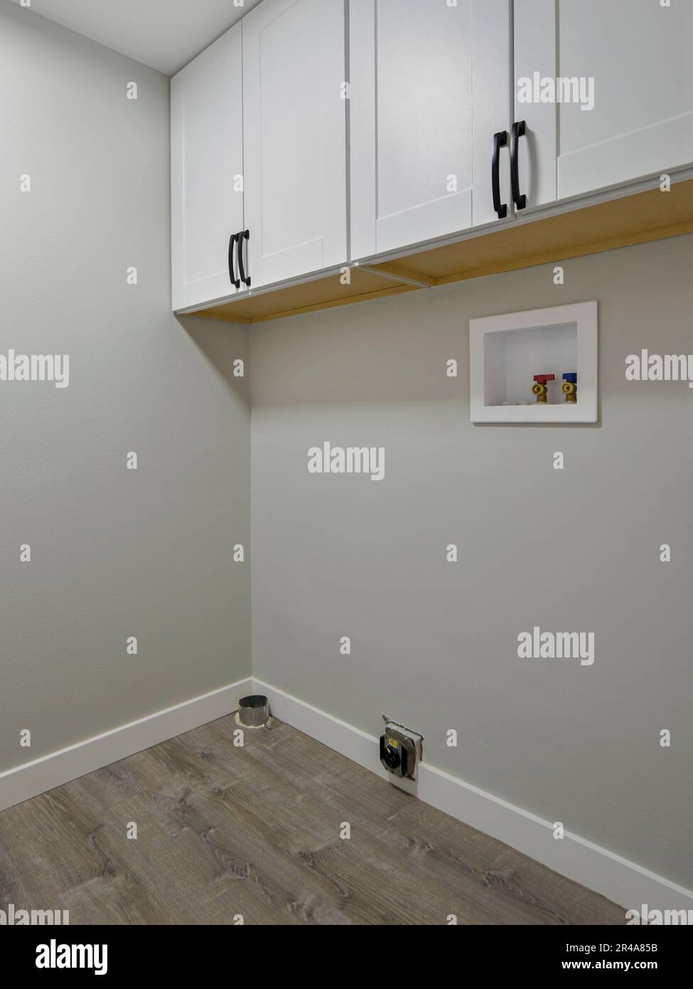 Modern residential empty laundry room interior Stock Photo - Alamy