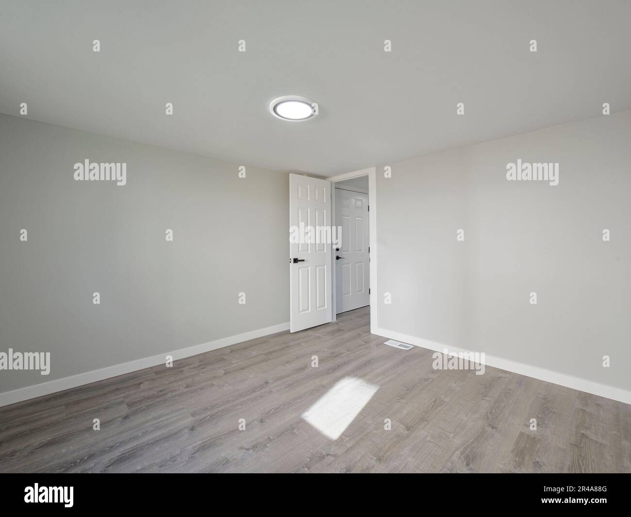Modern residential empty bedroom interior Stock Photo - Alamy