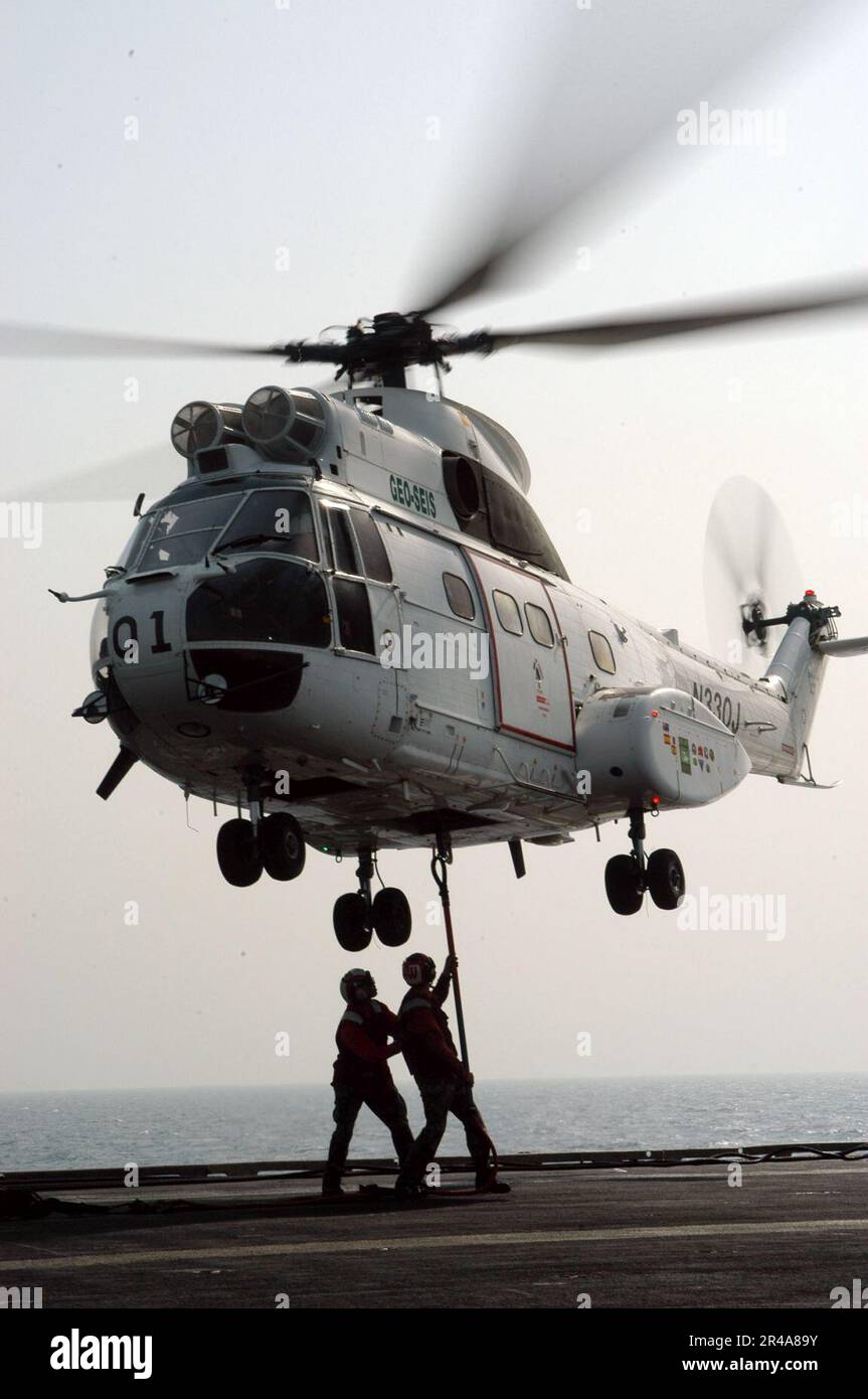 US Navy Aviation Ordnanceman aboard the aircraft carrier USS John F ...