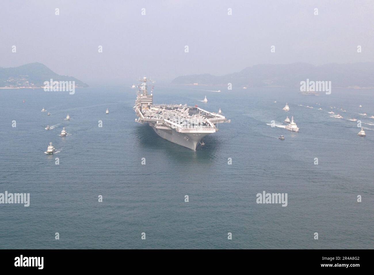 US Navy Nimitz-class aircraft carrier USS John C. Stennis (CVN 74) with Carrier Air Wing ...