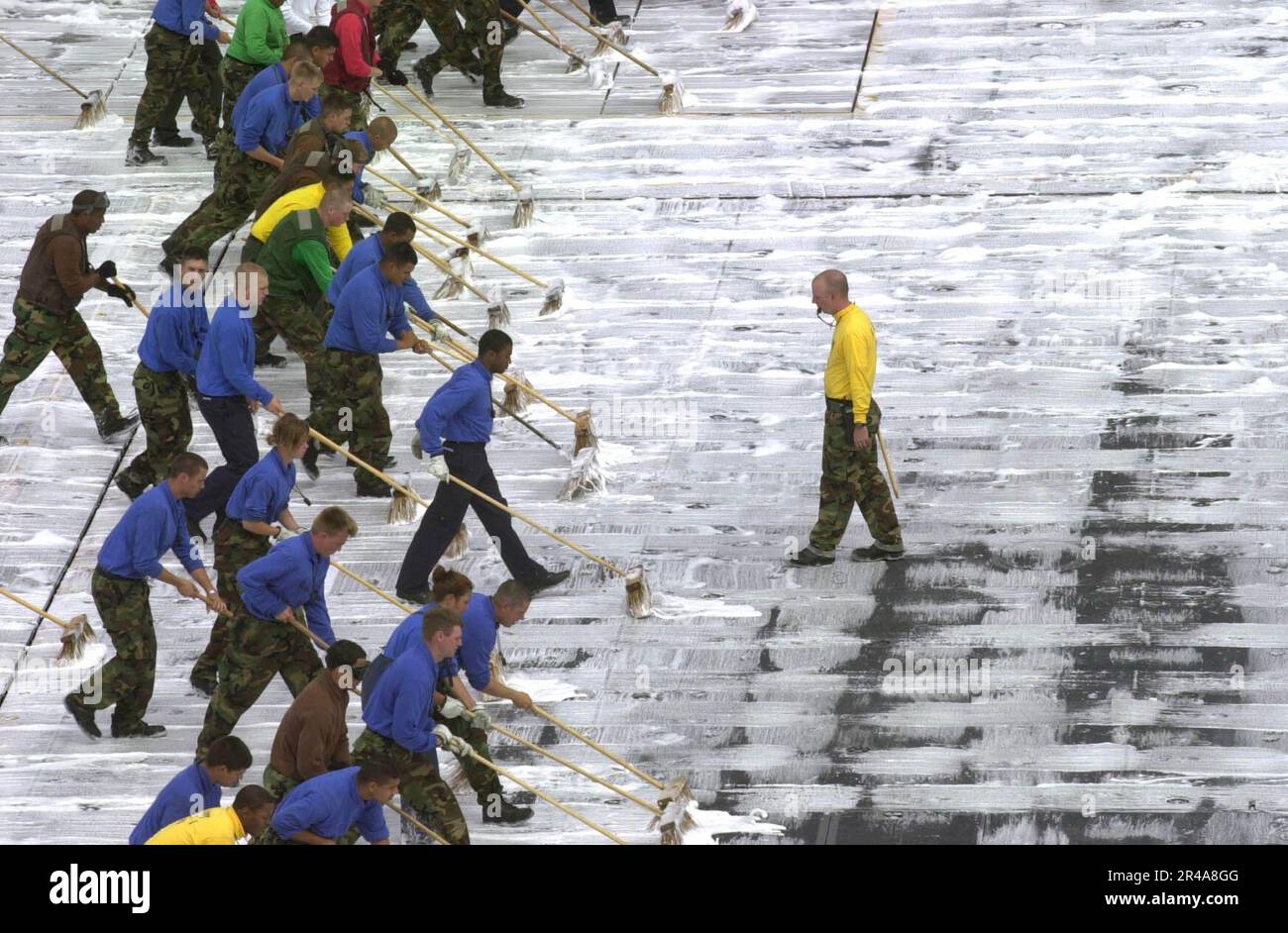 US Navy USS Nimitz (CVN 68) crew members participate in a Scrub ...