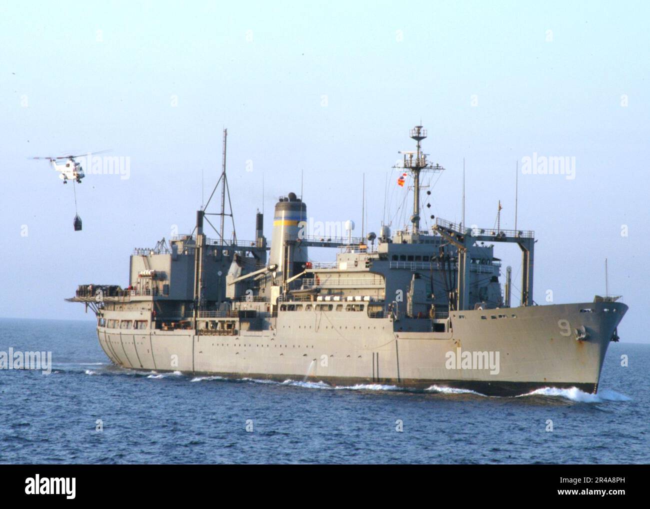 US Navy Military Sealift Command (MSC) combat stores ship USNS Spica (T-AFS 9) conducts a ...