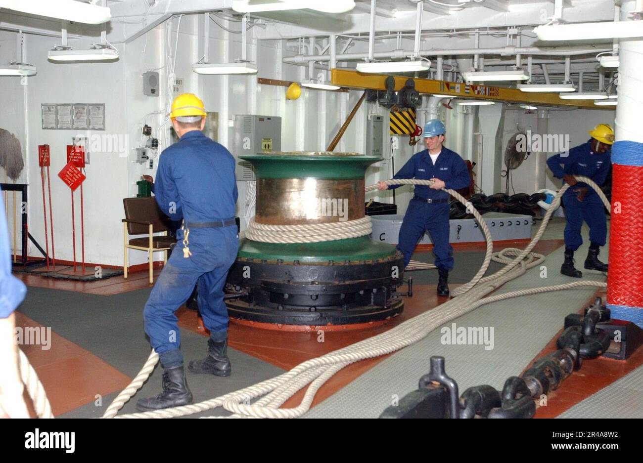 US Navy Sailors aboard the amphibious assault ship USS Boxer (LHD 4 ...