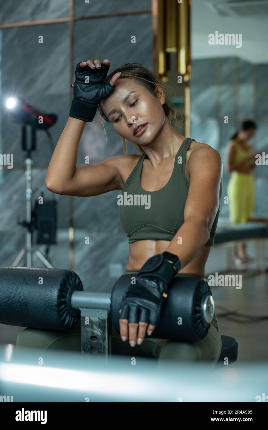 Woman gets heatstroke, Sport woman gets in pink sport shirt Dizzy and ...