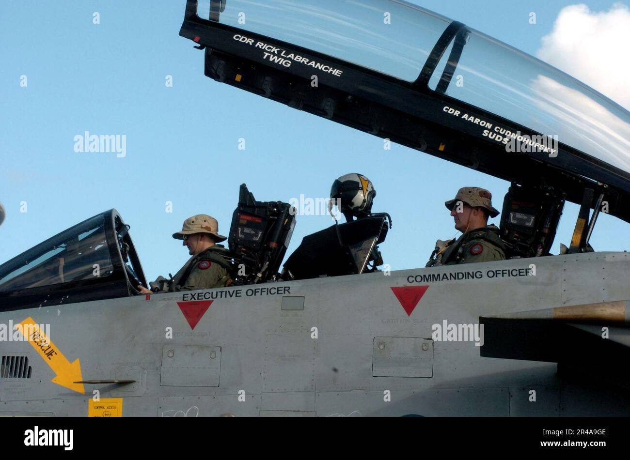 US Navy The aircrew of an F-14D Tomcat try to relax while standing the ...