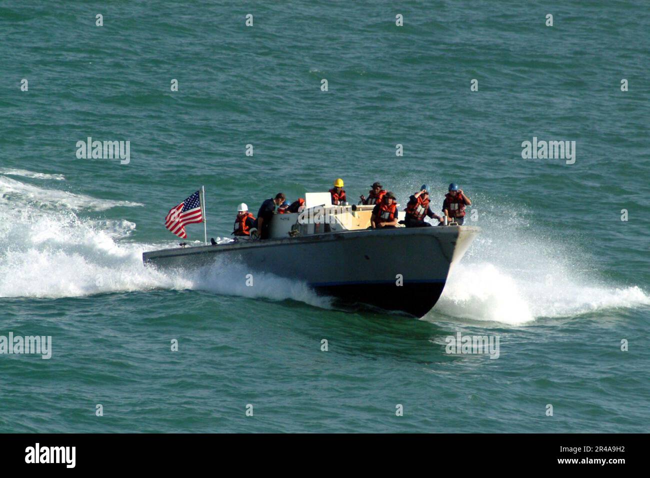 US Navy A small boat attached to the amphibious dock landing ship USS ...