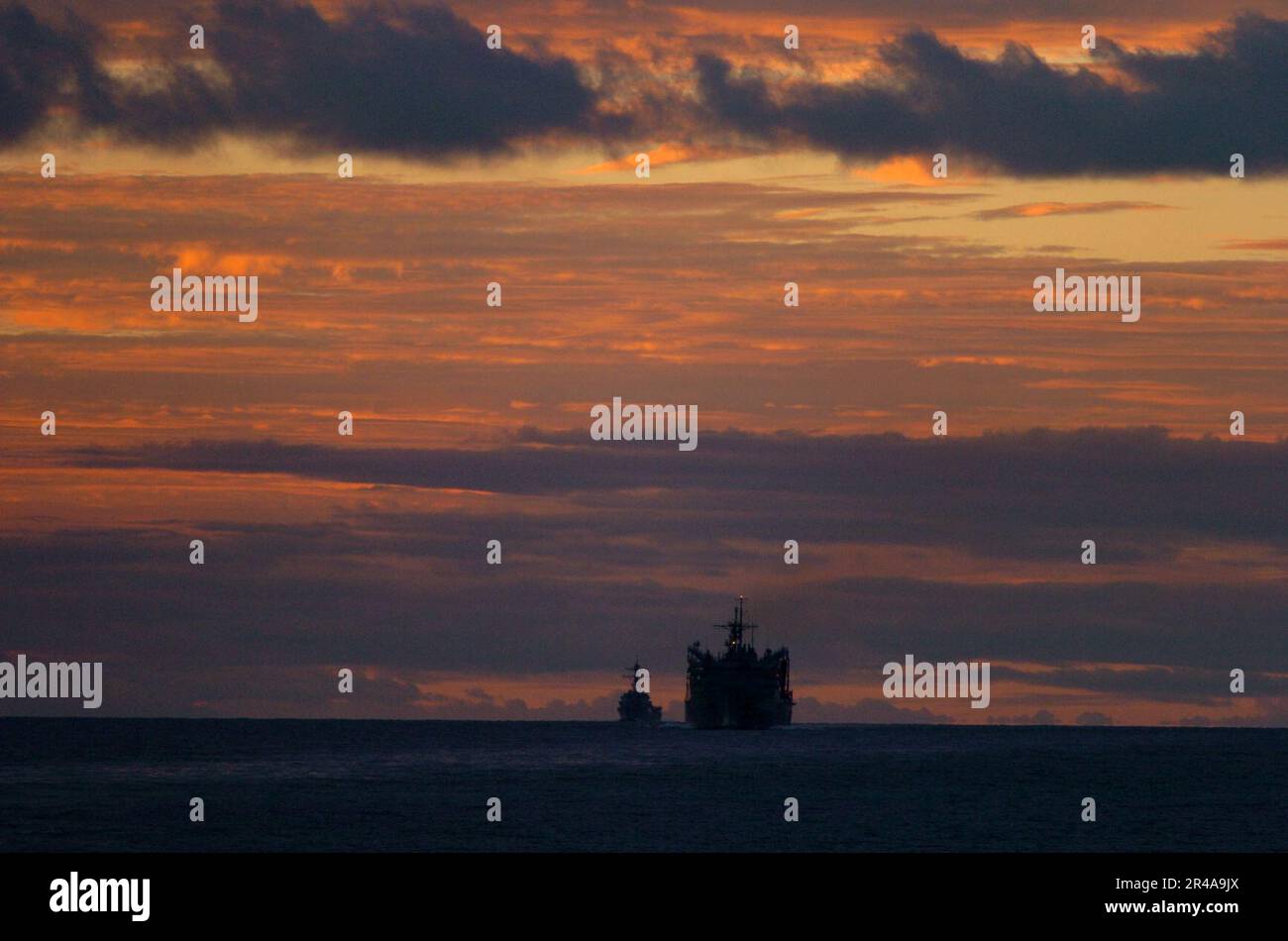US Navy Guided missile destroyer USS Howard (DDG 83), left, and fast ...