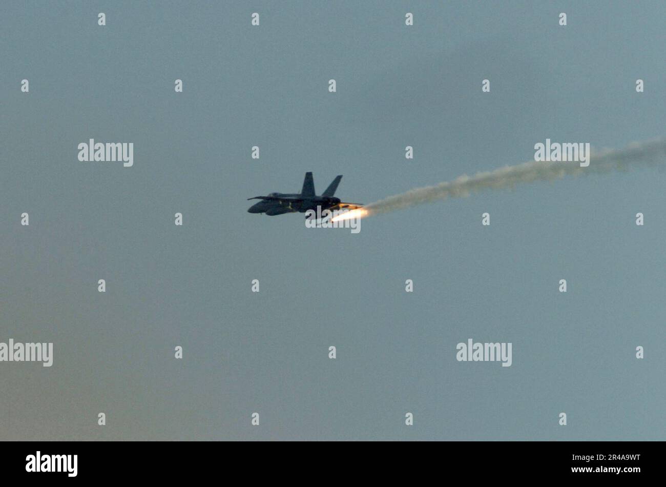 US Navy Cmdr. George Slook, launches an AIM-9M Sidewinder air-to-air ...