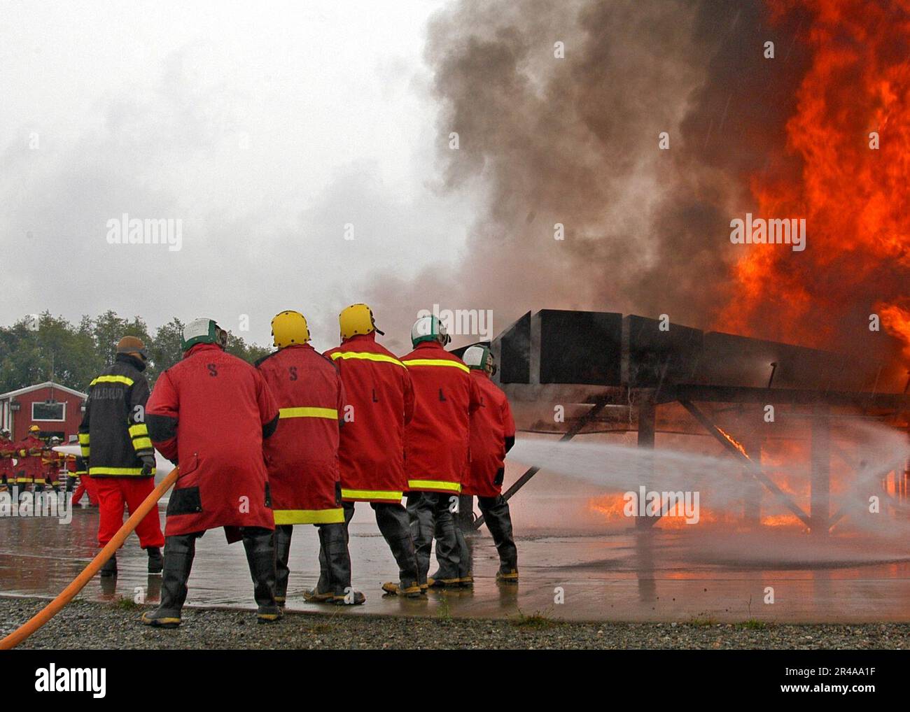 US Navy A flight deck fire party assigned to the Coast Guard Cutter ...