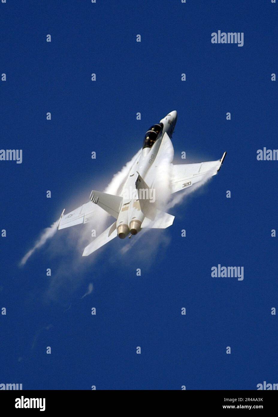 US Navy An F-A-18F Super Hornet conducts a high-speed pass Stock Photo ...