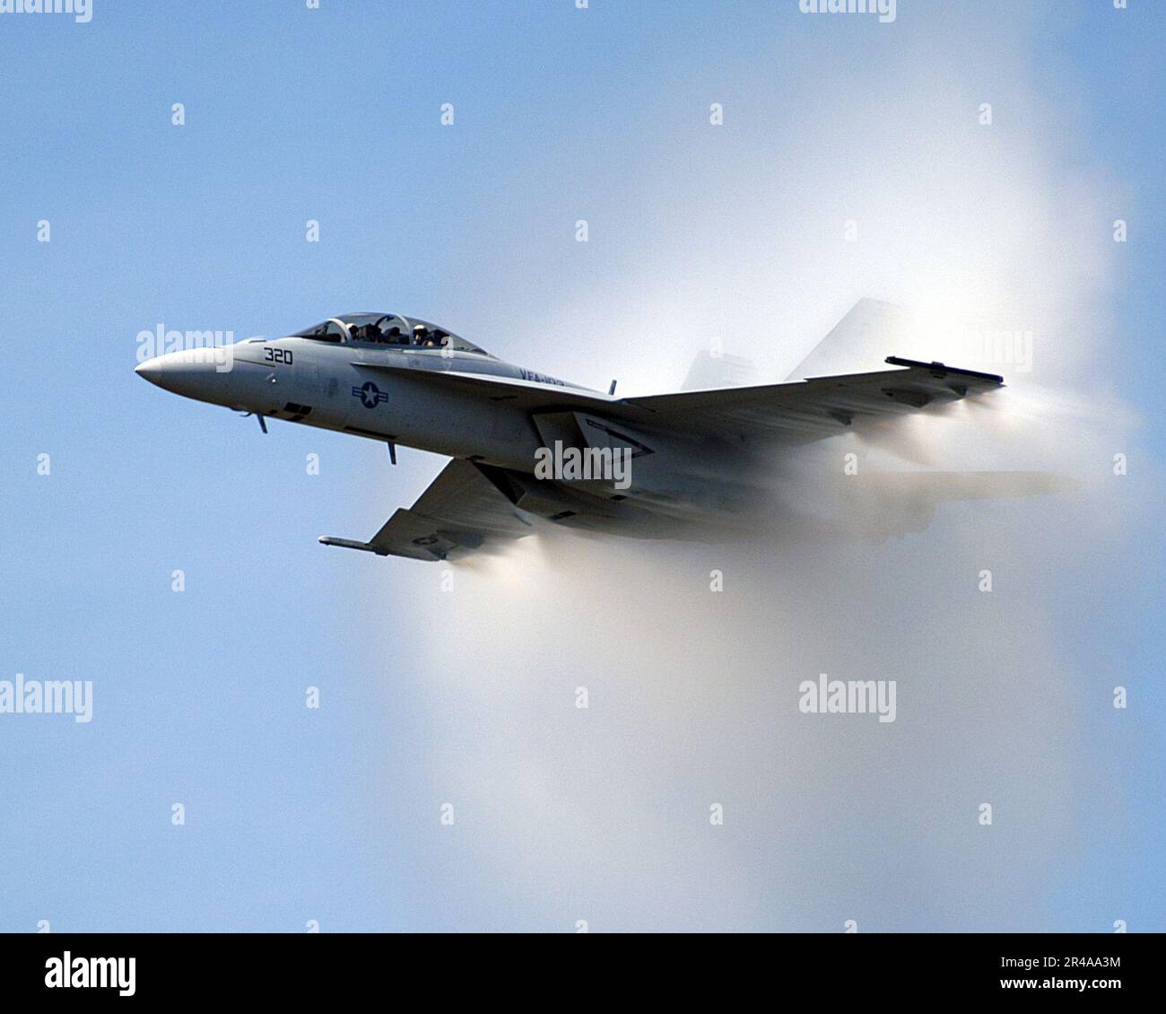 US Navy An F-A-18F Super Hornet conducts a high-speed pass in front of ...