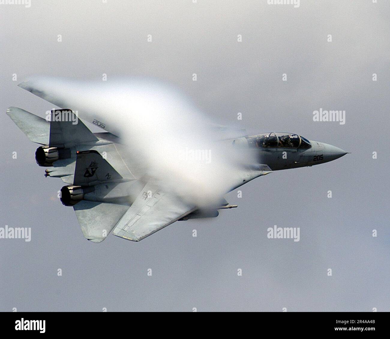 US Navy An F-14B Tomcat conducts a high-speed pass at the conclusion of ...