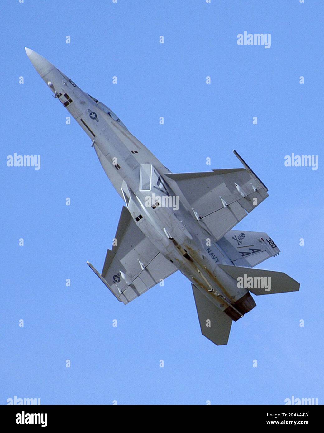 US Navy An F-A-18F Super Hornet flies an aerial demonstration in front ...