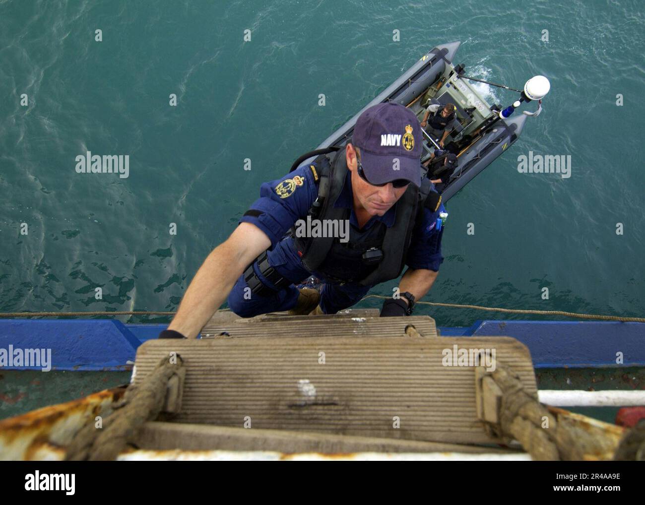US Navy A Royal Australian Navy Sailor climbs a Jacob's Ladder while ...
