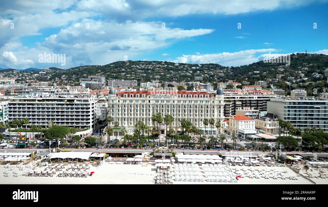 An aerial view of a coastal town with multiple buildings on the French ...