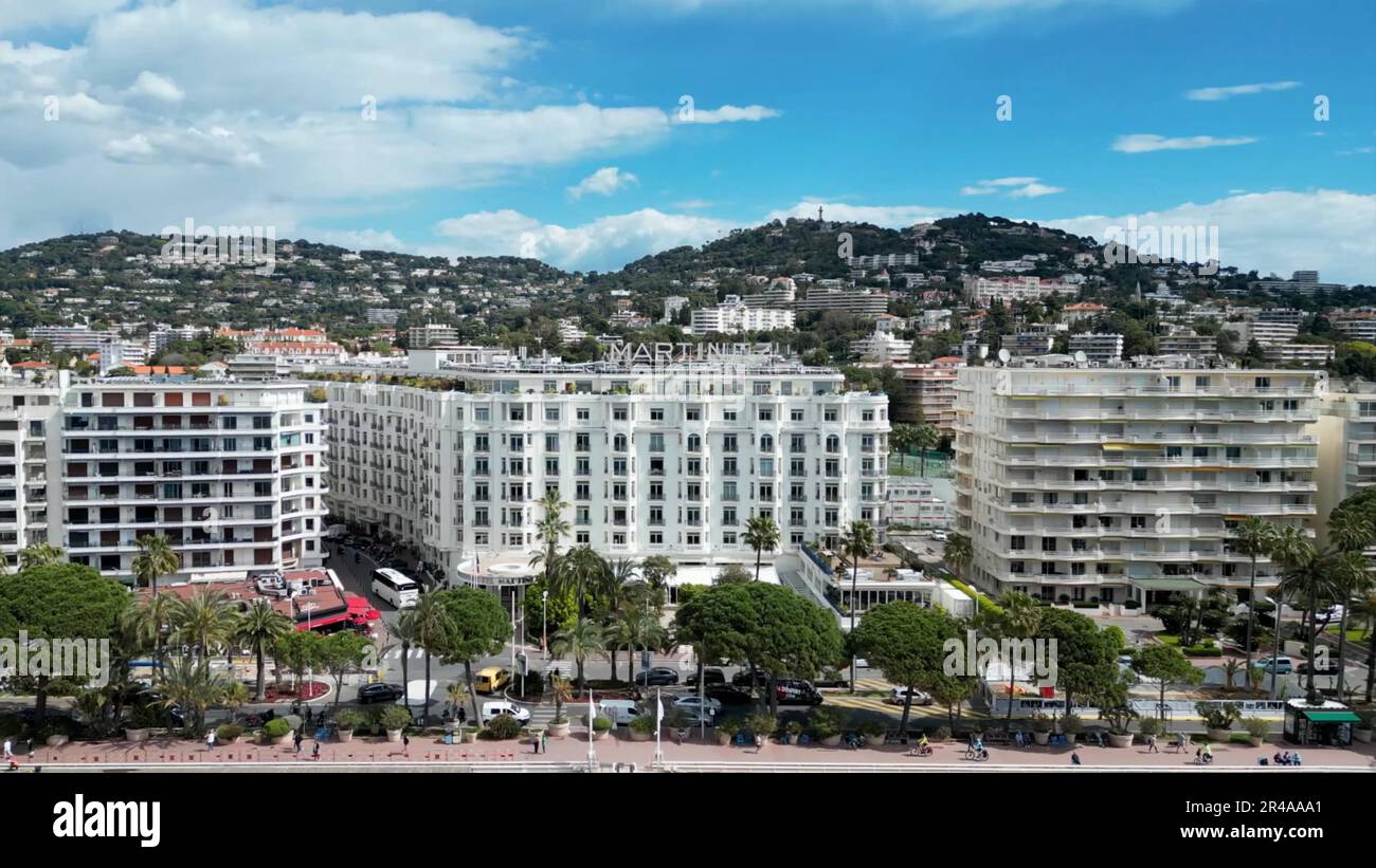 An aerial view of a coastal town with multiple buildings on the French ...