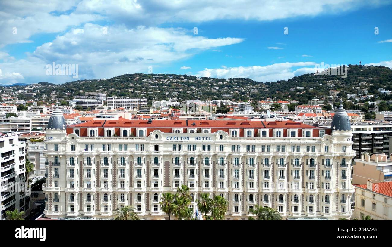 An aerial view of a coastal town with multiple buildings on the French ...