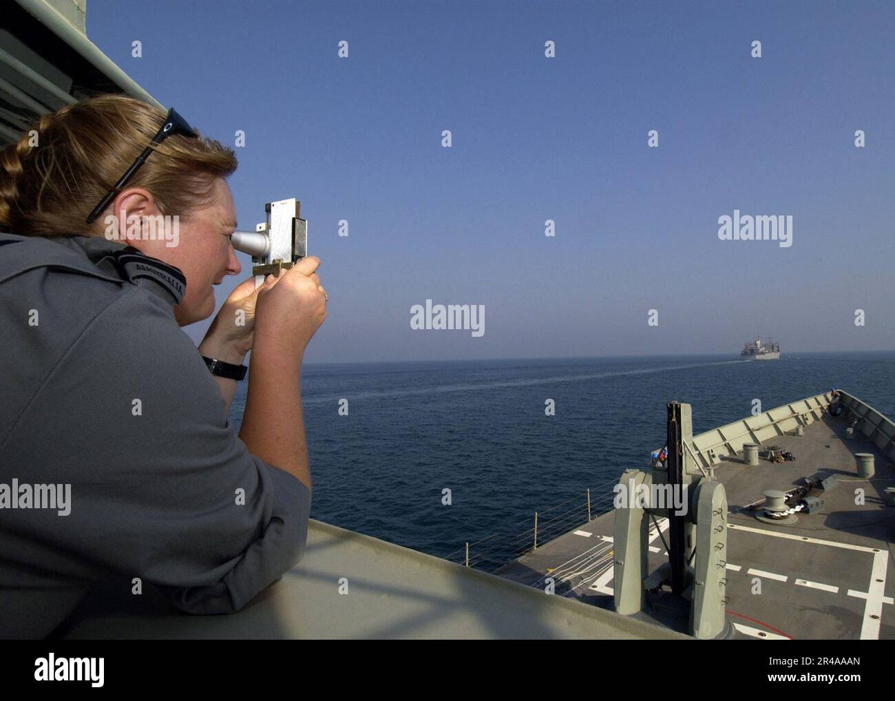 US Navy An Officer assigned to the Royal Australian Navy, uses a ...