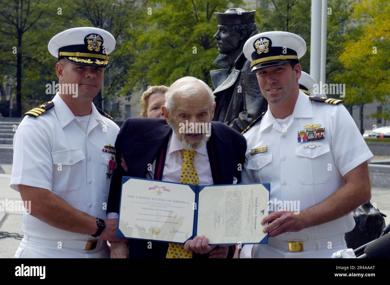 US Navy From left, Cmdr. Michael Hegarty, Former Secretary of the Navy ...