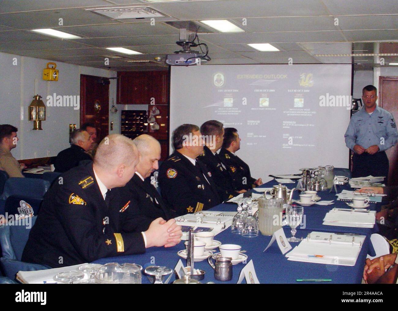 US Navy Rear Adm. Sergy Avakyants, Rear Adm. Aleksandr Poroshin, second ...