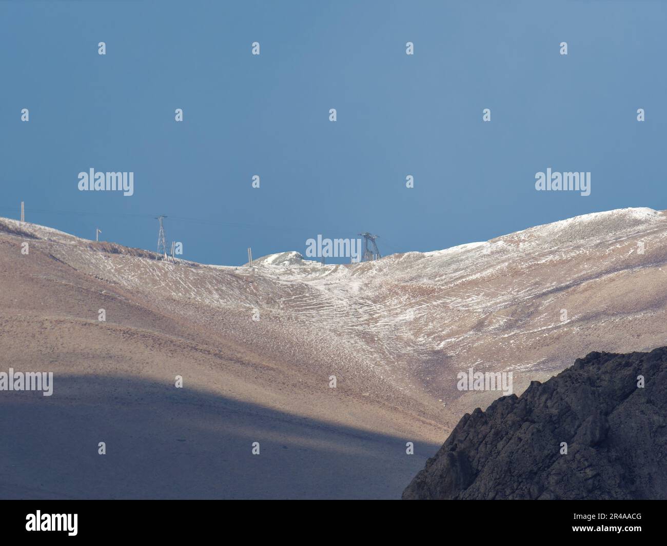 A scenic view of the Alborz mountains blanketed in snow in Iran Stock ...