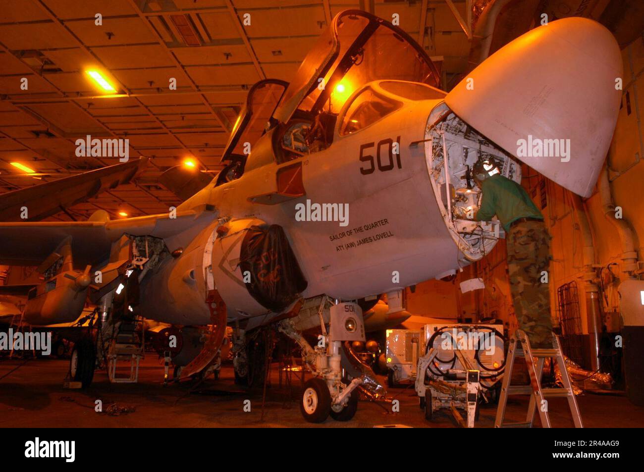 US Navy An Aviation Electronic Technician trouble shoots an APS-130 ...