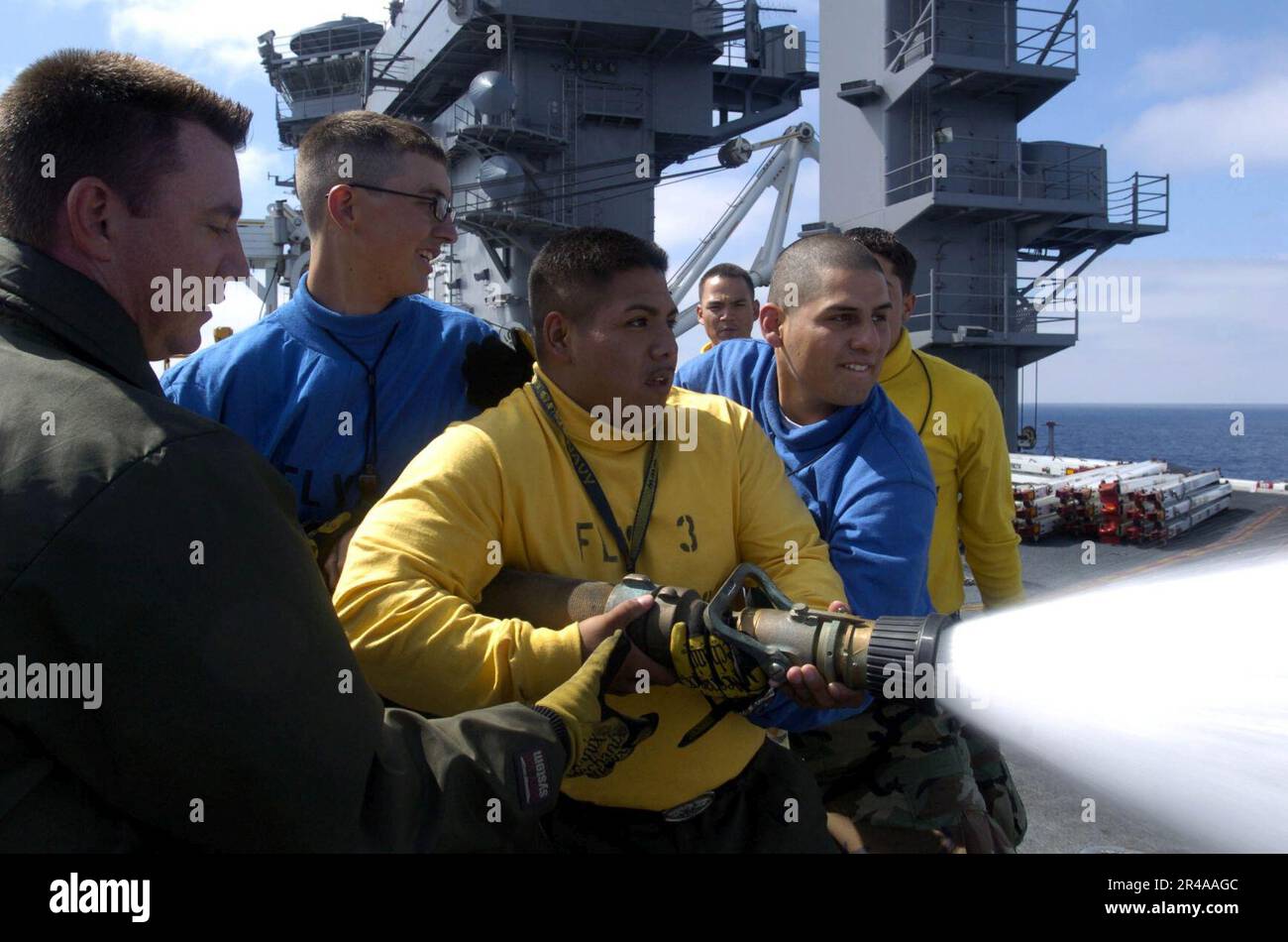 US Navy Air Department personnel participate in aircraft fire fighting ...