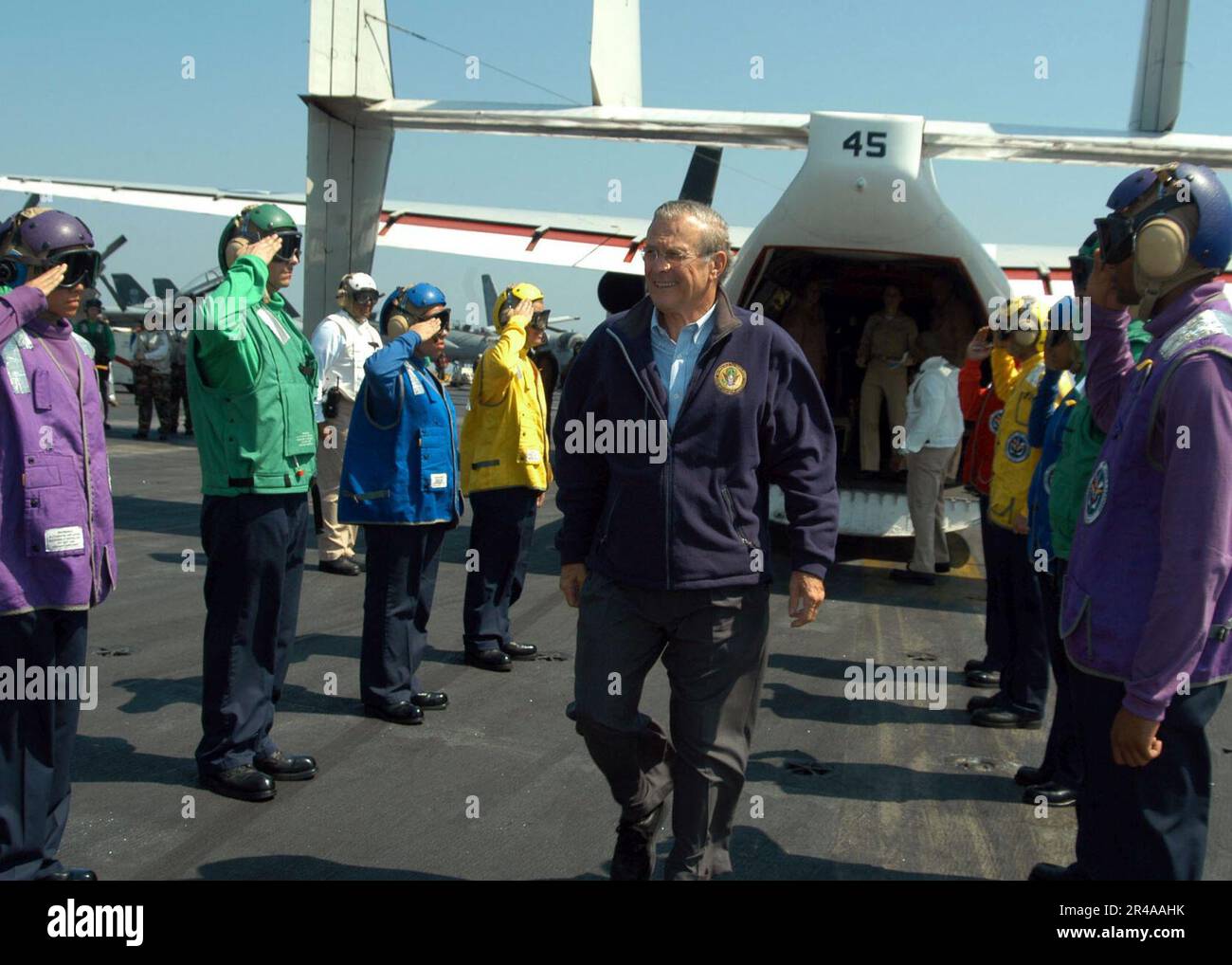 US Navy Secretary of Defense (SECDEF), Donald H. Rumsfeld visits with ...